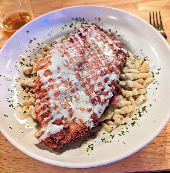 This isn't just schnitzel&mdash;it's a golden-brown masterpiece atop a bed of kluski noodles, waiting to transport you to Eastern Europe.