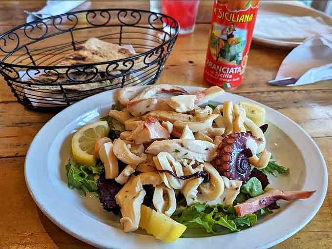 Fresh seafood tops crisp greens in this salad, offering a lighter option that still delivers on flavor and satisfaction.