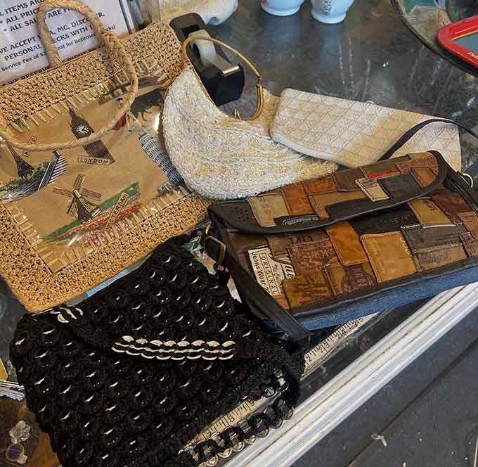 Handbags from various eras showcase how women carried their essentials through decades of changing fashion and social expectations.