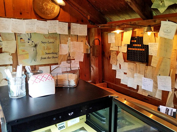 The "PIE" sign isn't subtle, but subtlety isn't required when you're this good. The fruit pie selection is organized with the precision of a pie library.