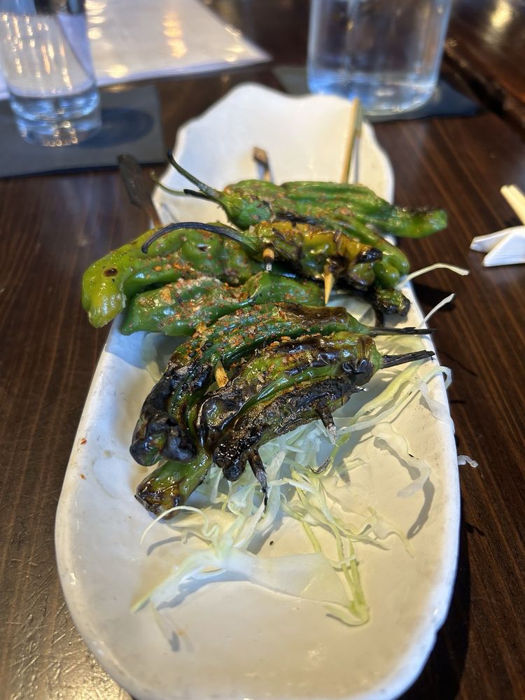 Blistered to perfection, these green flavor bombs play culinary Russian roulette – most are mild, but occasionally one brings the heat.