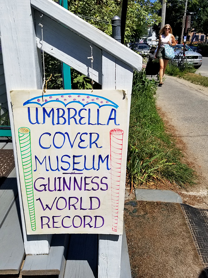 Hand-painted with care, this sidewalk sign announces the world's most unexpected Guinness World Record holder to passing island visitors.