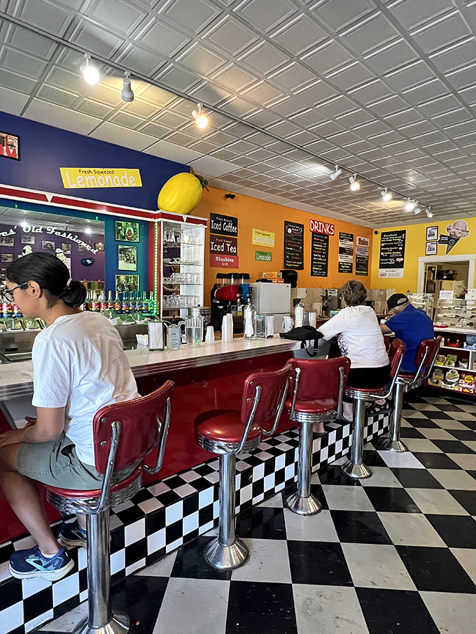 Counter: The command center of confectionery magic where soda jerks orchestrate fizzy symphonies and scoop dreams into reality.
