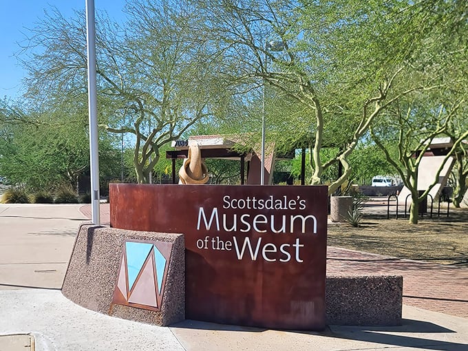 The museum's entrance sign welcomes visitors with understated elegance, hinting at the treasures waiting inside.