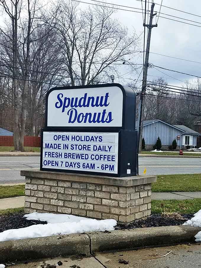 Storefront Sign: The blue and white beacon of Berea announces fresh-brewed coffee and daily-made donuts, seven days a week.