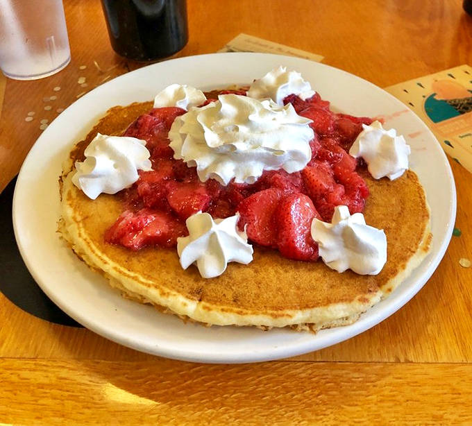 Breakfast of champions! These strawberry-crowned pancakes make waking up early seem like the smartest decision you've ever made.