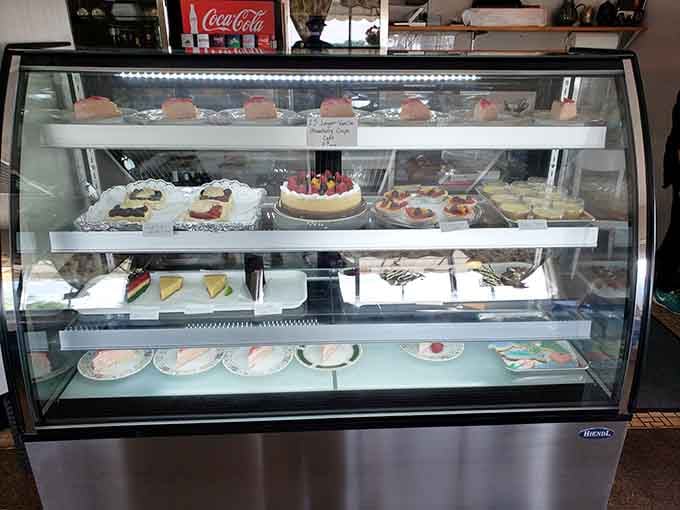 The dessert case tempts diners throughout their meal, showcasing sweet masterpieces that make saving room for dessert absolutely essential.