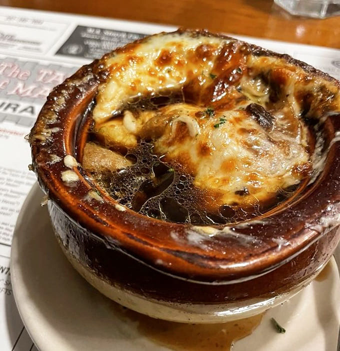 French onion soup with that perfectly melted cheese blanket looks like it could cure whatever ails you, or at least make you forget about it.
