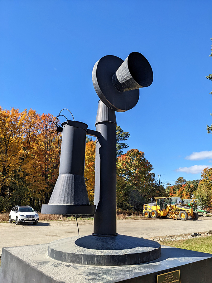 The telephone sculpture's impressive stature makes it impossible to miss, even when construction equipment tries to upstage it in the background.