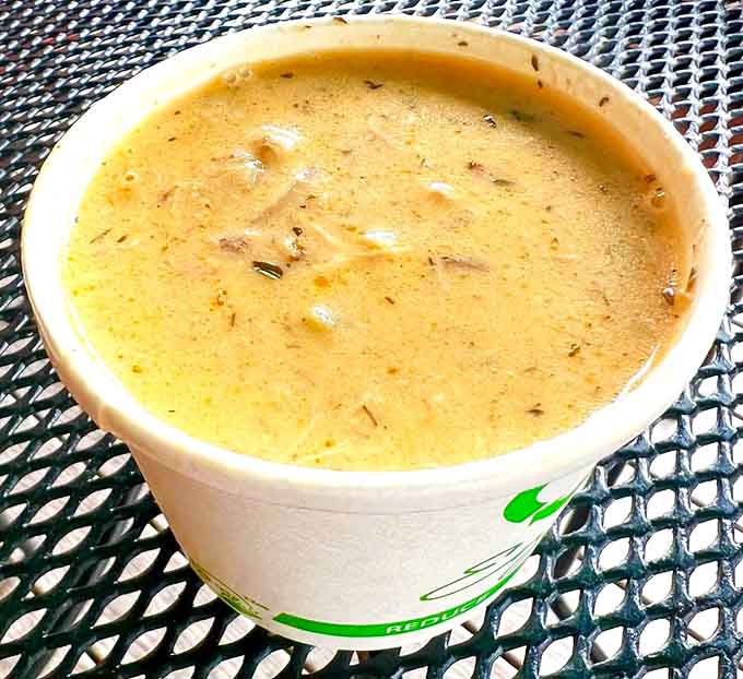 Creamy smoked salmon chowder warms you from the inside out, packed with generous chunks of fish and hearty vegetables.