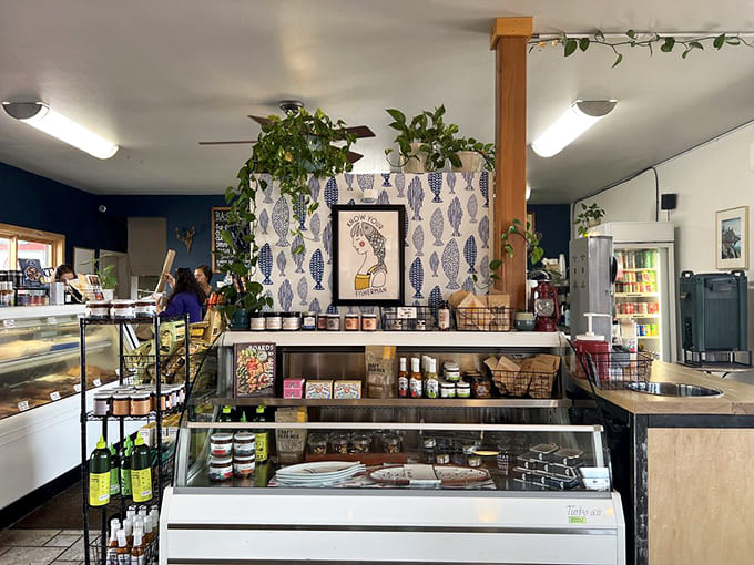 That blue accent wall and retail display prove you can grab lunch and some stylish merchandise in one convenient, delicious stop.