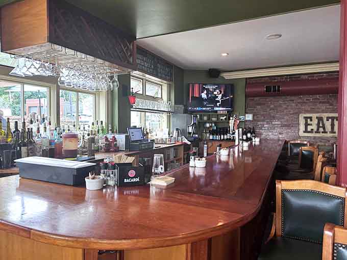 The bar area offers front-row seats to watch skilled bartenders craft lattes with the precision of artists.