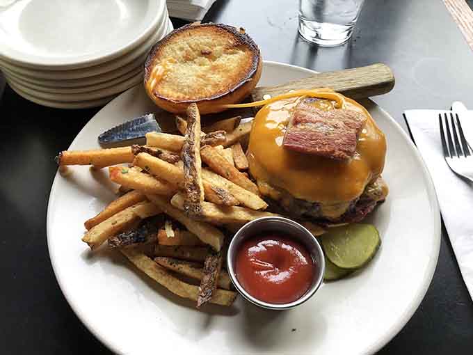 The Bottineau Burger arrives like it's auditioning for a food magazine cover, and honestly, it deserves the gig.