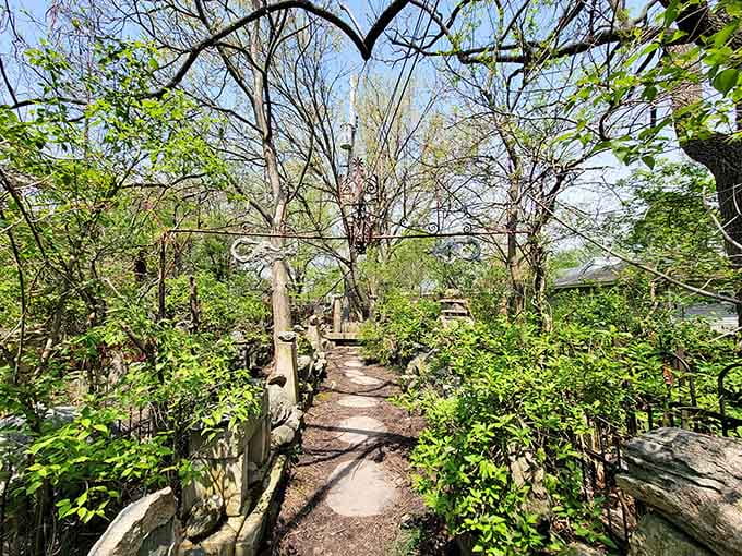 The garden pathways wind through installations like a philosophical obstacle course, where every turn presents another weighty question wrapped in stone.