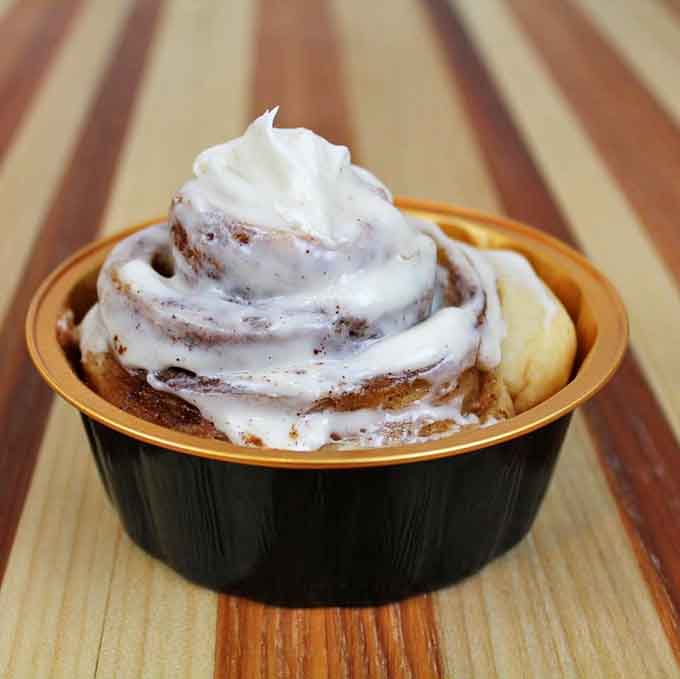 This cinnamon roll with its swirl of frosting is giving off serious "I'm the reason you'll need elastic waistbands" energy, and we're here for it.