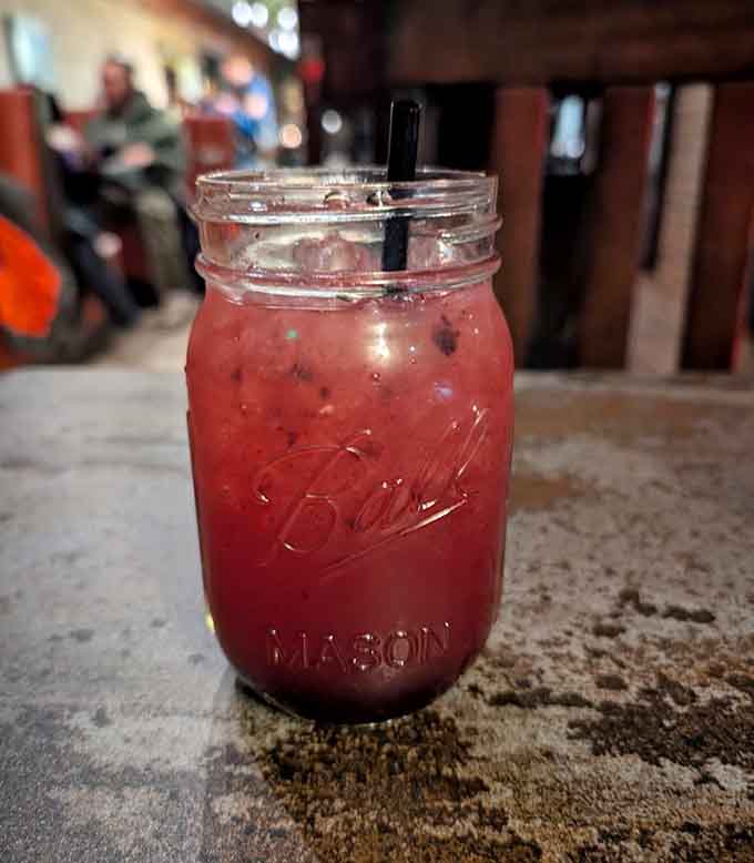 This ruby-red concoction in a mason jar looks like summer in liquid form, sweet and refreshing enough to make you forget it's winter outside.
