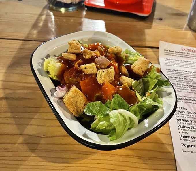 Even the side salad gets attention here, fresh and crisp with just the right toppings.