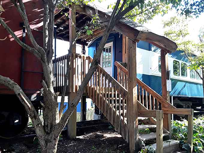 These wooden steps lead to adventures in a converted train car, where imagination and history create the perfect getaway.
