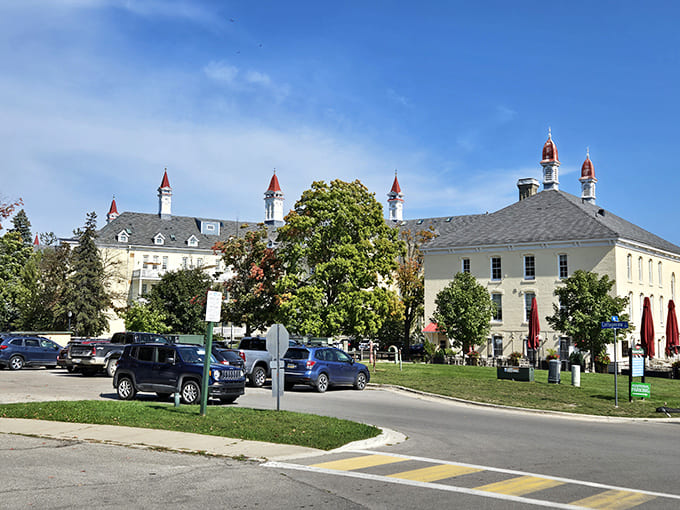 The modern parking area serves as a reminder that this historic asylum has transformed into a vibrant community space welcoming visitors year-round.