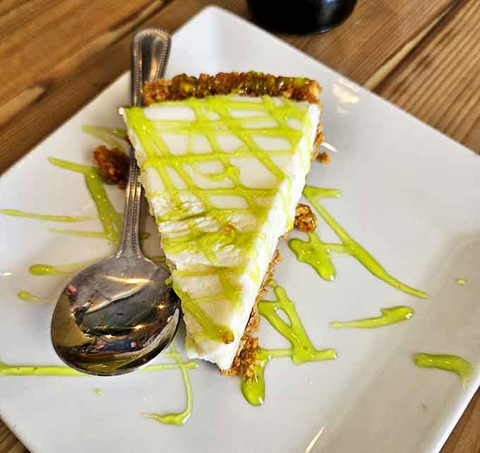 Key lime pie with a twist! The graham cracker crust cradles tangy-sweet filling, while the lime drizzle adds both visual appeal and an extra citrus punch.