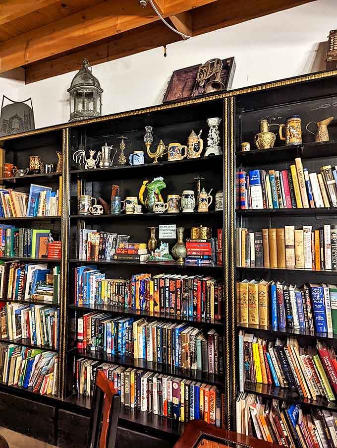 Books and beer steins share shelf space, proving that knowledge and good drinks have always gone together perfectly.