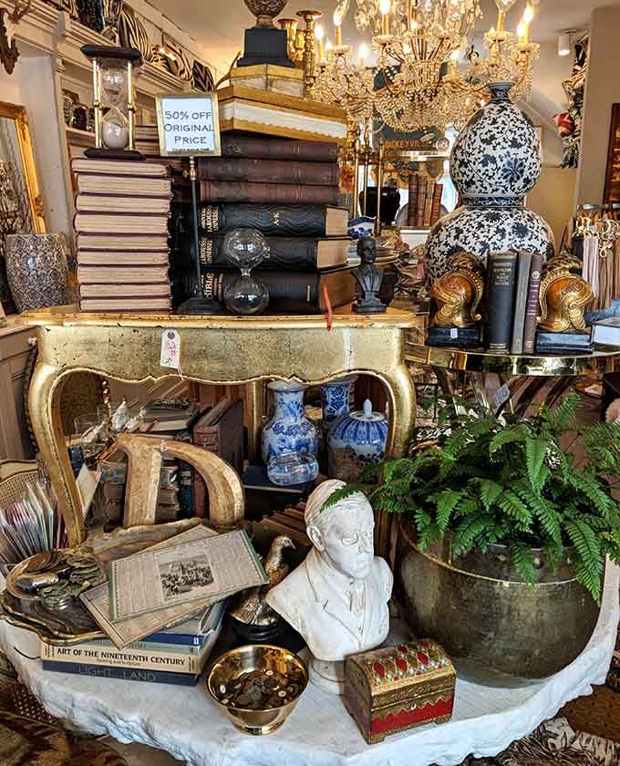 When vintage books meet decorative objects and everything's bathed in chandelier light, you're not shopping anymore, you're curating your own personal museum.