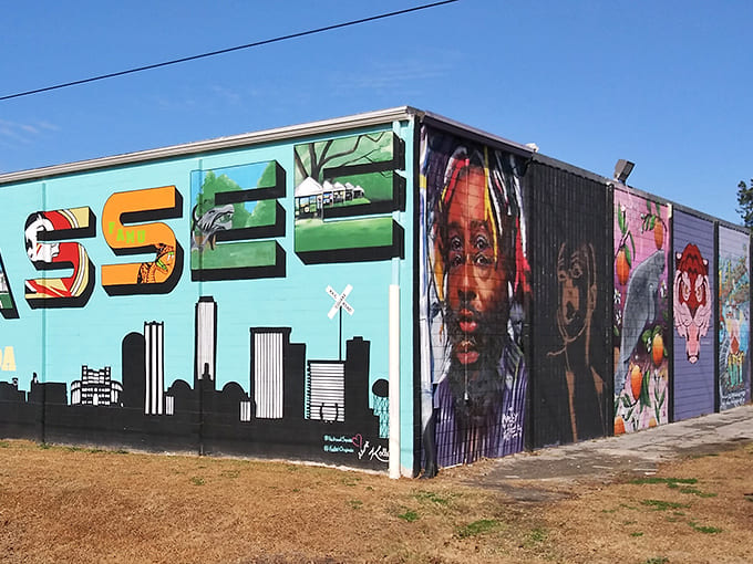 Street art transforms the exterior into a vibrant canvas celebrating local culture, making this vintage warehouse impossible to miss and even harder to forget.