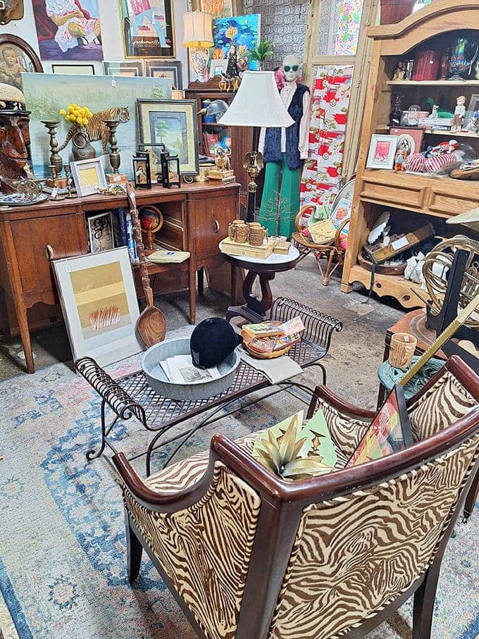 Vintage and antique items (other area): A zebra-print chair meets vintage tables in this eclectic corner where every item seems to be having its own fascinating conversation.