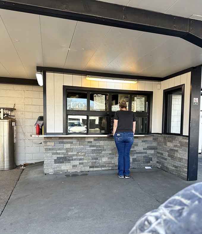 The order window at Wally's is where dreams begin and hunger ends, a portal to drive-in perfection.