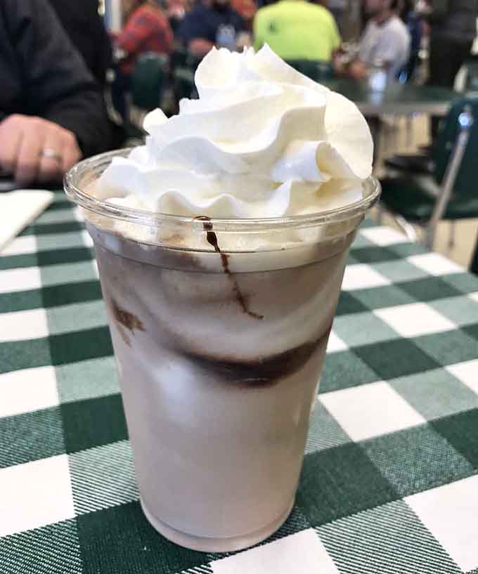 This chocolate malt is thick enough to stand a spoon in and topped with whipped cream that reaches for the sky.