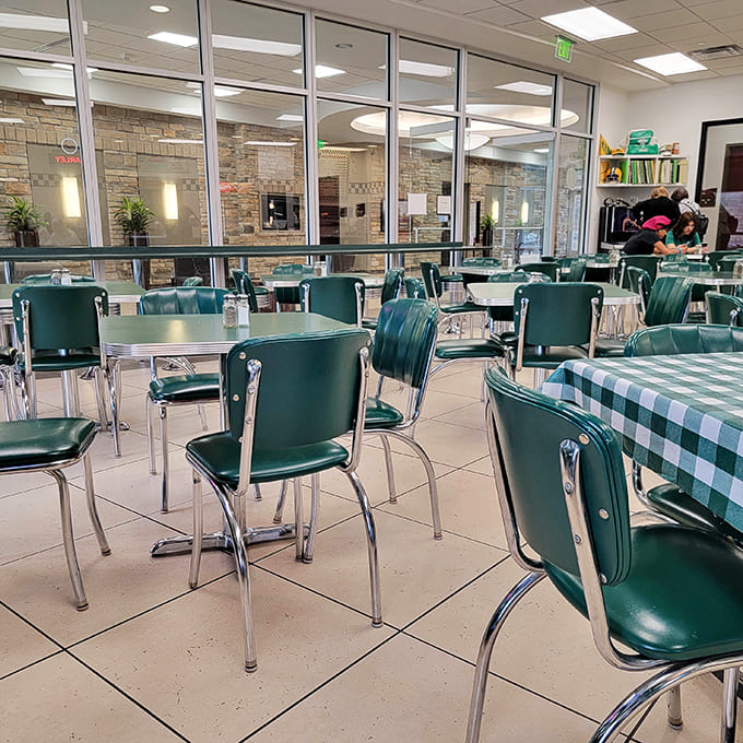 Another angle reveals the cafeteria-style counter where magic happens, with staff efficiently assembling sandwiches that have satisfied generations of hungry Minnesotans.
