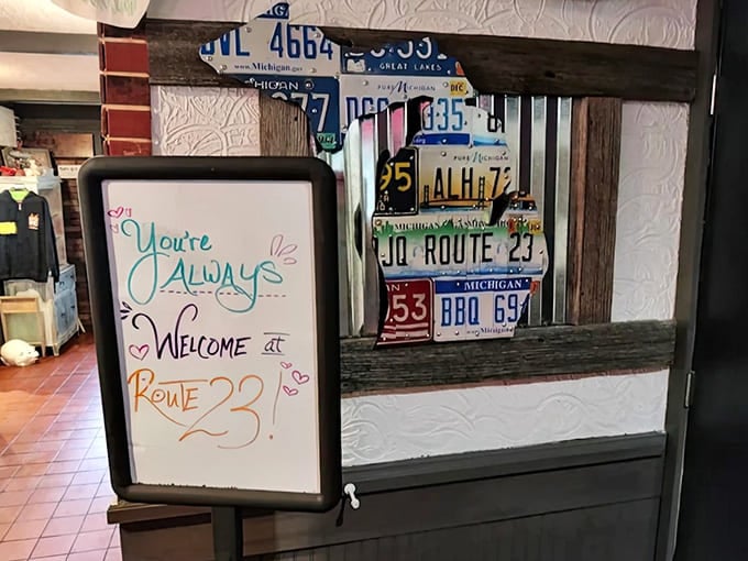 Welcome Board: A handwritten welcome that captures the spirit of Route 23 &ndash; where you arrive as customers but leave as part of the barbecue family.