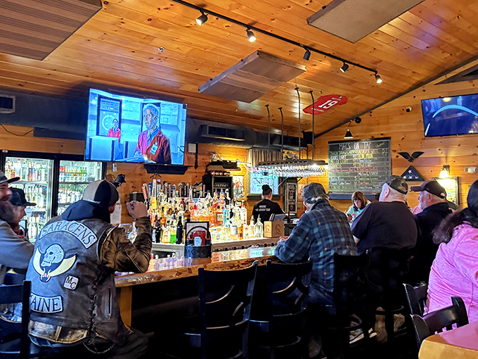 The well-stocked bar serves as both social hub and liquid artistry center, where bartenders know your name or make you feel like they should.