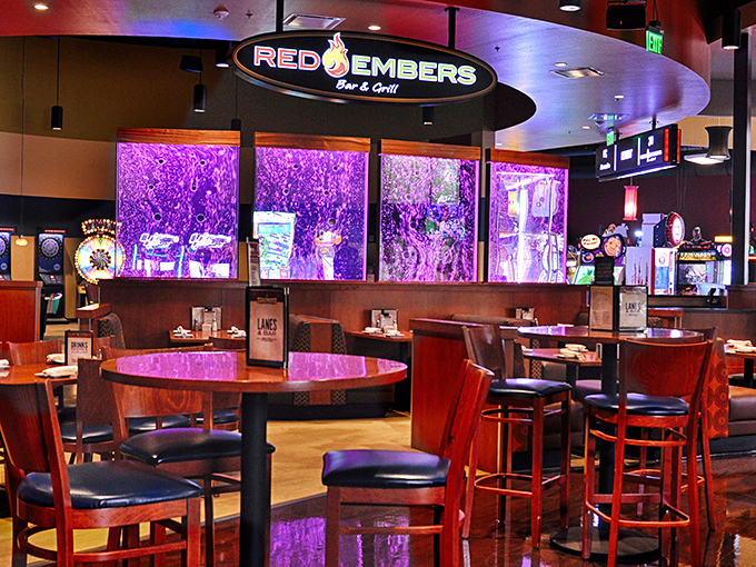 Red Embers Bar & Grill offers a dining experience that goes far beyond typical alley fare, with mood lighting that flatters both food and diners.