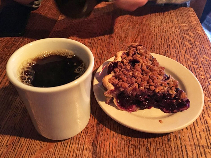 A slice of heaven that's bluer than a Vermonter's mood in mud season. This pie could turn even the sourest puss into a grinning Cheshire cat.