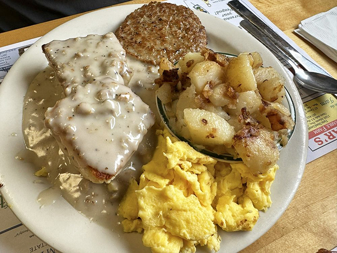 Biscuits and gravy with home fries and eggs &ndash; the breakfast that launched a thousand road trips.