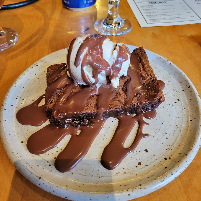 Chocolate decadence that doesn't just satisfy a sweet tooth&mdash;it throws a full-on party for it. That ice cream melting into warm brownie is pure theater.