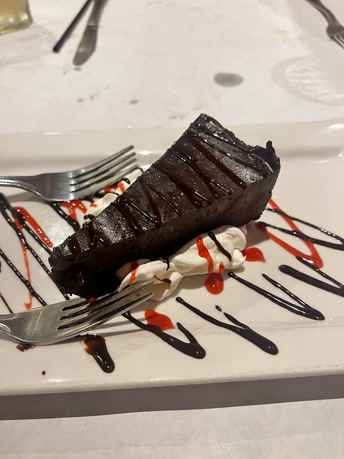 The chocolate cake provides a dramatically delicious finale, with rich chocolate playing against bright raspberry coulis like a culinary standing ovation.