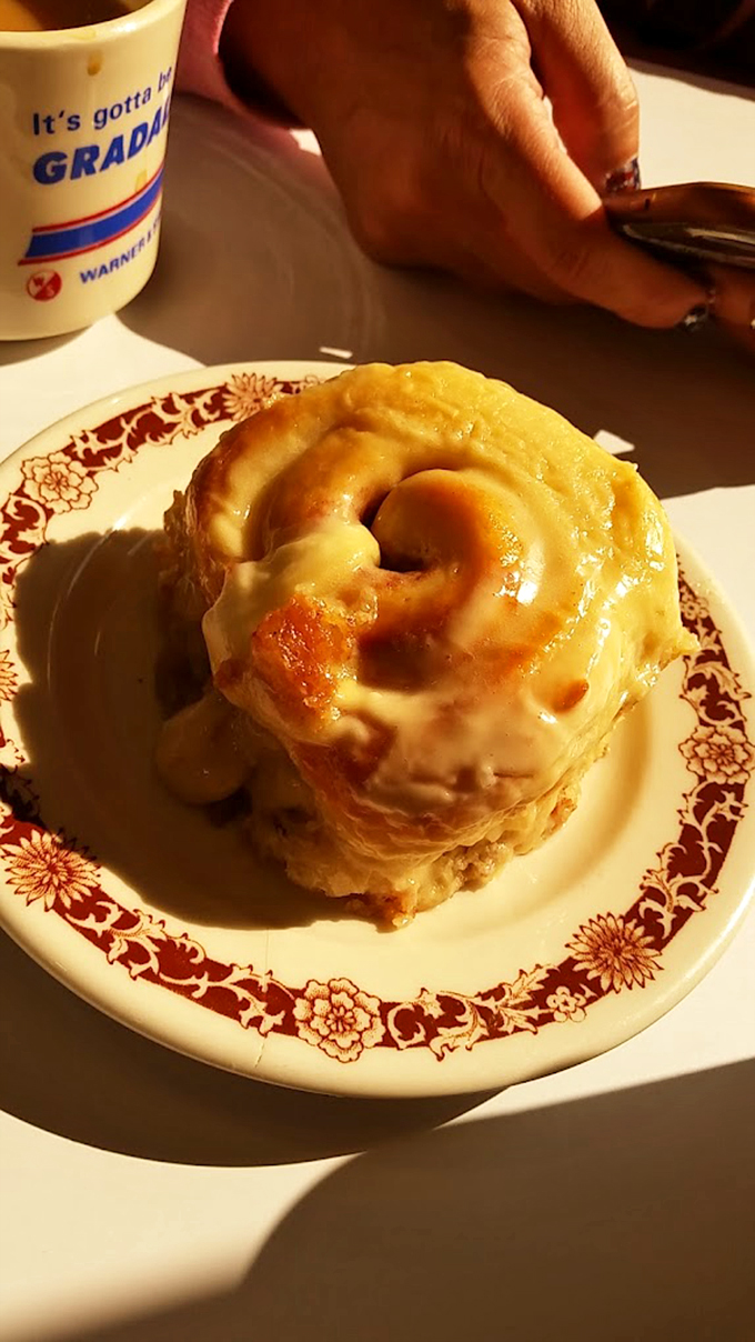 Spiral of sugary bliss! This cinnamon roll is big enough to share, but trust me, you won't want to.