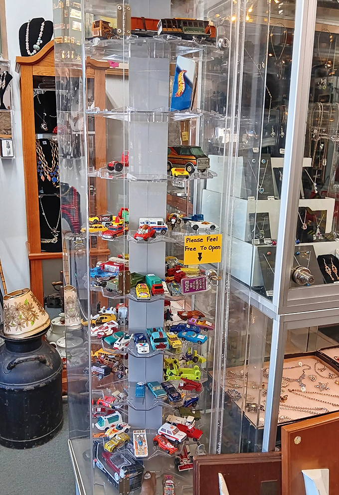 Collectibles: Vintage toys in their clear display case, begging to be played with again. These Hot Wheels have been waiting decades for their next race.