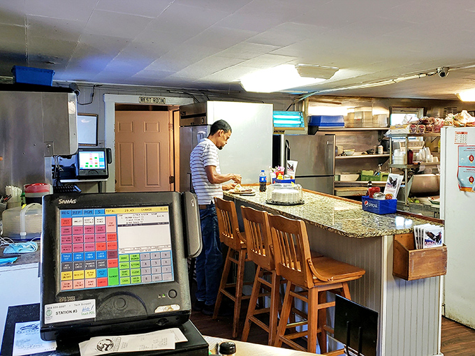 Behind the scenes where the magic happens &ndash; the efficient kitchen space where seafood is transformed into memorable meals.
