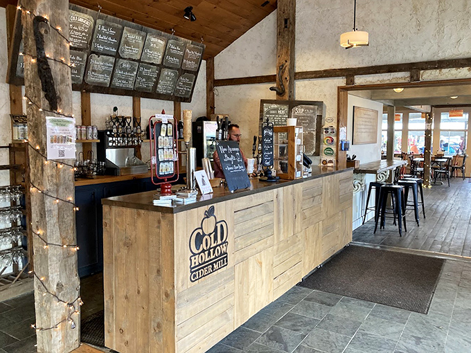 Rustic wooden counter service area where cider dreams come true &ndash; the command center for donut distribution and cider sampling.