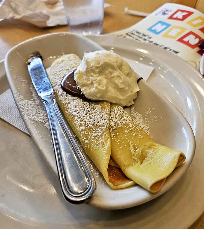 Delicate crepes filled with chocolate and topped with whipped cream &ndash; proof that the French occasionally get breakfast very, very right.