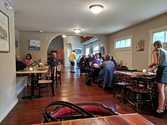 A bustling dining room where every table feels like the best seat in the house &ndash; community and cuisine in perfect harmony.