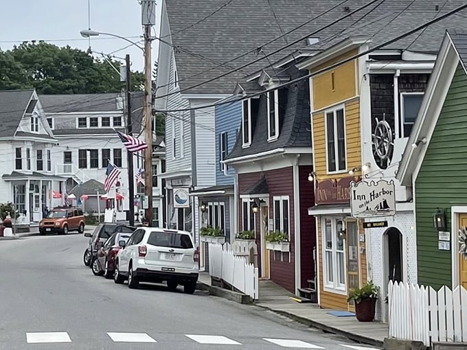 Inn on the Harbor welcomes visitors with classic New England charm, its weathered shingles and white trim epitomizing coastal Maine architecture.