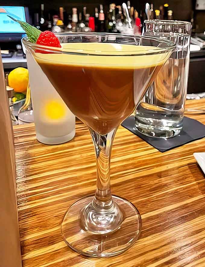 This isn't just an espresso martini &ndash; it's dessert in a glass, topped with a perfect raspberry and promising a sweet, caffeinated finale.