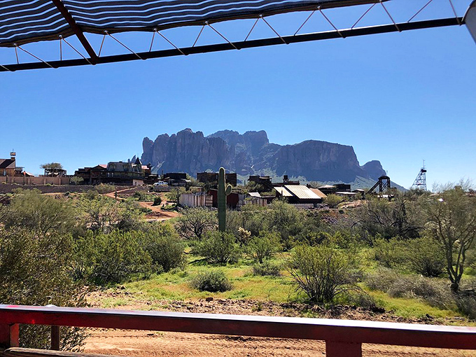 The breathtaking view of Goldfield Ghost Town with the majestic Superstition Mountains creating a picture-perfect Arizona backdrop.