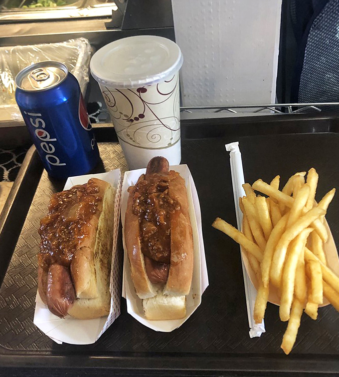 The humble frankfurter elevated to art form, nestled in toasted New England buns and topped with homestyle chili that puts chain restaurants to shame.