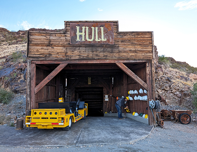 The Hull Mine entrance stands as a monument to underground courage. Yellow carts wait eternally for miners who will never return.
