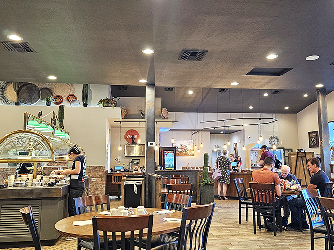 Modern pendant lighting and rustic touches create an atmosphere that's both contemporary and comfortingly familiar.